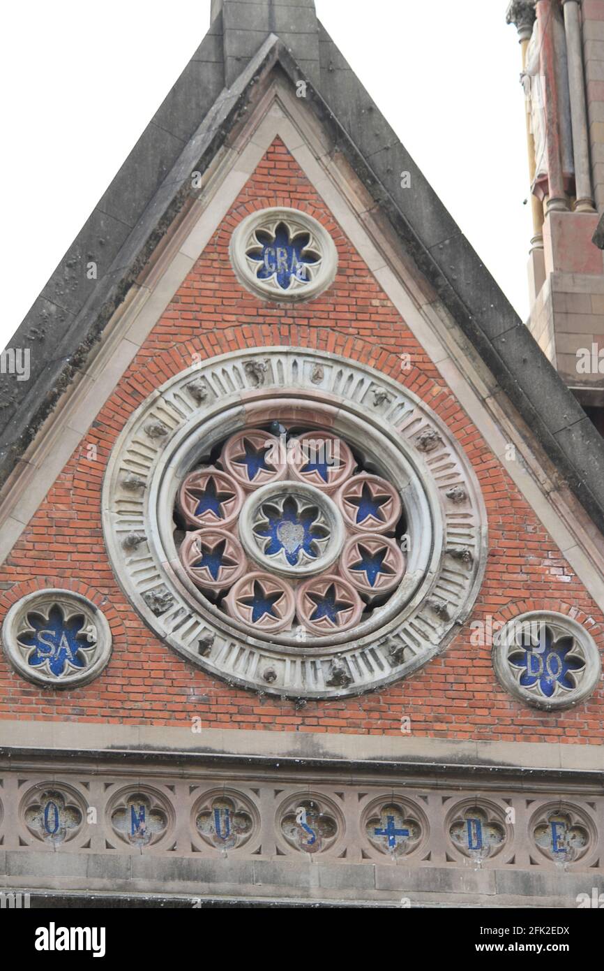 Gothic rosette windows on the facade of the church Stock Photo - Alamy