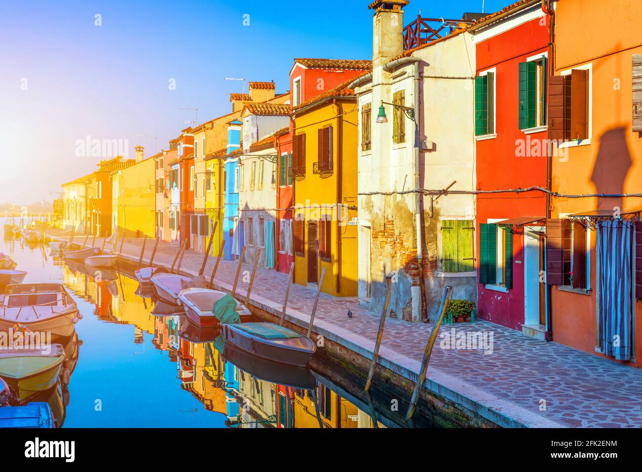 Street with colorful buildings in Burano island, Venice, Italy ...