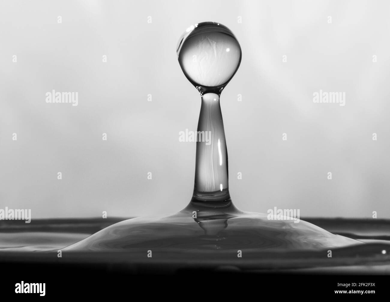 Liquid flowing in transparent Black and White Stock Photos & Images - Alamy