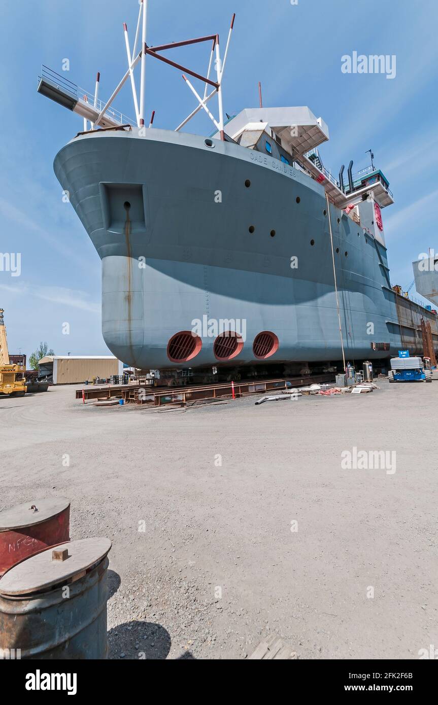 View of port side and bow of a large ocean-going ship in dry dock in ...