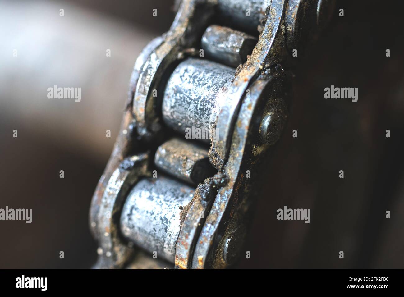 Old, rusty and worn industrial motorbike chain with links close-up ...