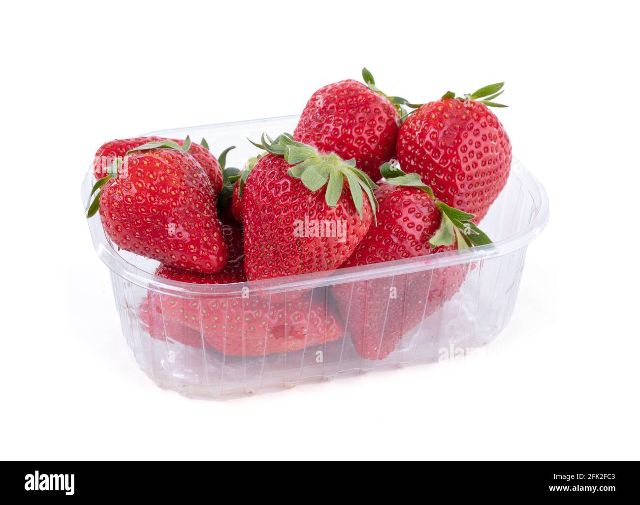 Strawberry tray, ripe on a white background Stock Photo - Alamy