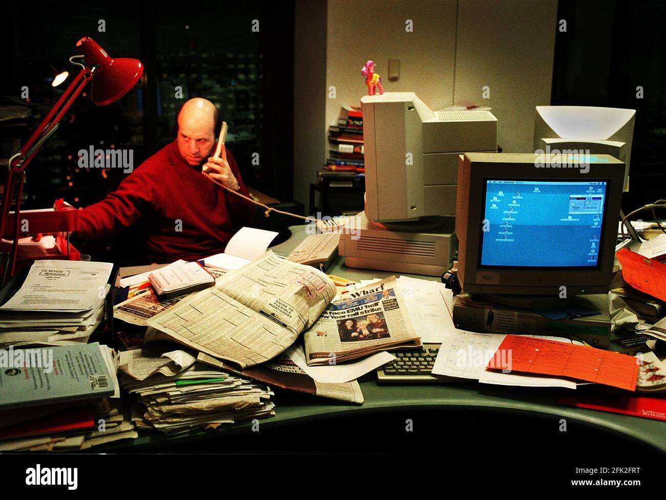 A man working late in the office Stock Photo - Alamy