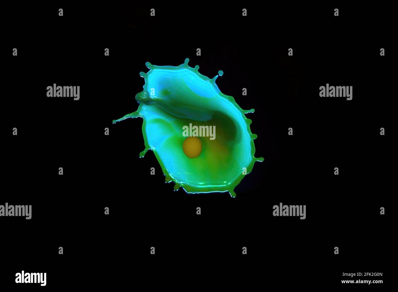 A water drop splash shaped like an egg in a shell - liquid drop art ...