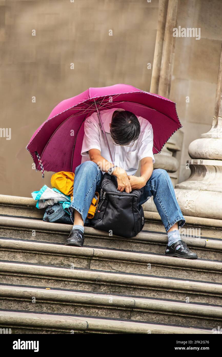 Hunched over hi-res stock photography and images - Alamy