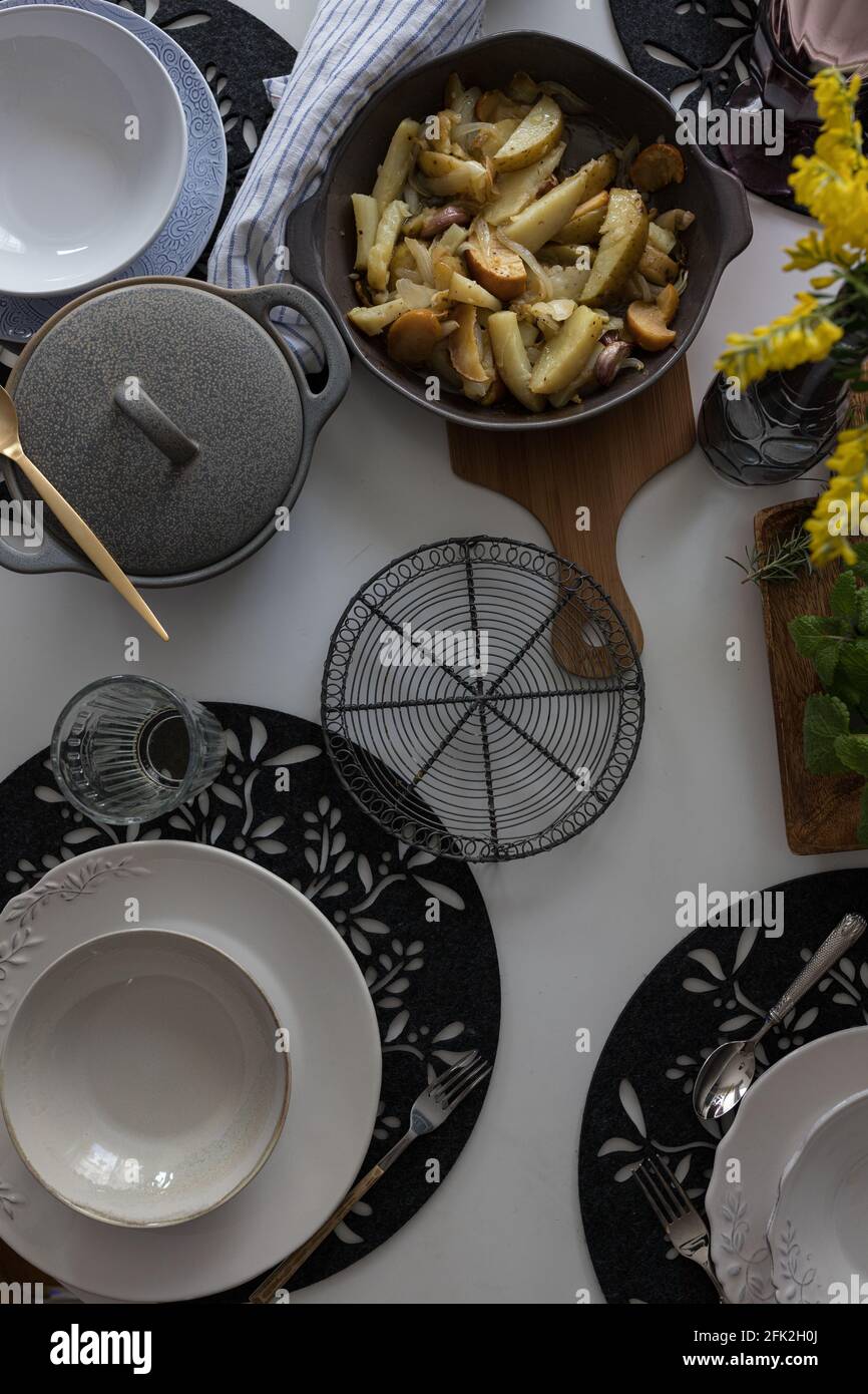 Table ready for a delicious dinner at home with a tray full of roast ...