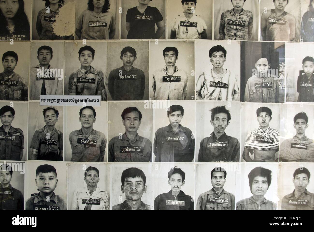 Photos of victims displayed at the Tuol Sleng Genocide Museum, formerly ...