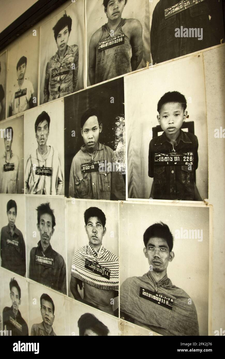 Photos of victims displayed at the Tuol Sleng Genocide Museum, formerly ...