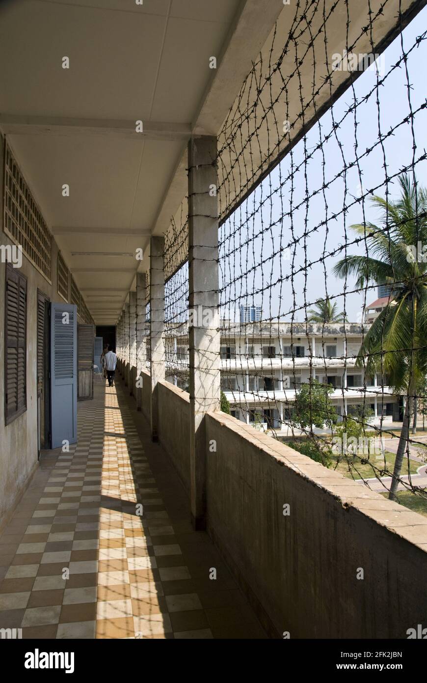 Barbed wire remains on walkways of Tuol Sleng Genocide Museum, formerly ...