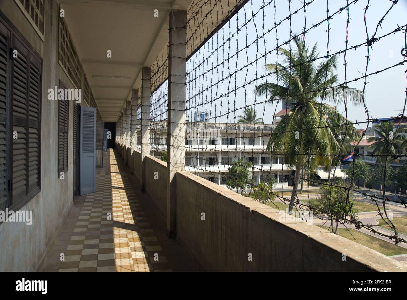 Barbed wire remains on walkways of Tuol Sleng Genocide Museum, formerly ...