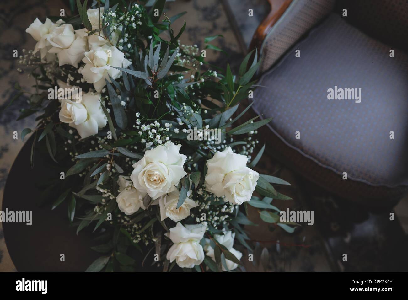 Boho style wedding bouquet of white roses Stock Photo - Alamy