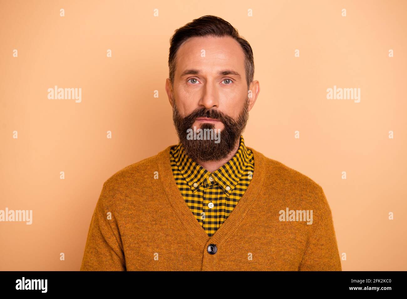 Photo of nice person look camera no emotions face wear checkered shirt ...