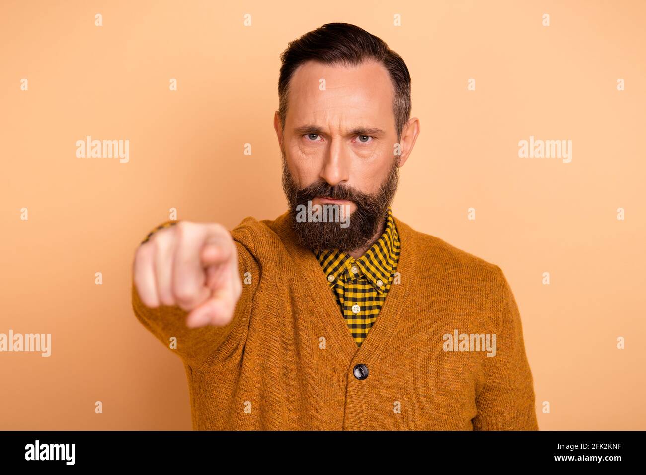 Photo of strict serious angry man indicate finger you look camera wear ...