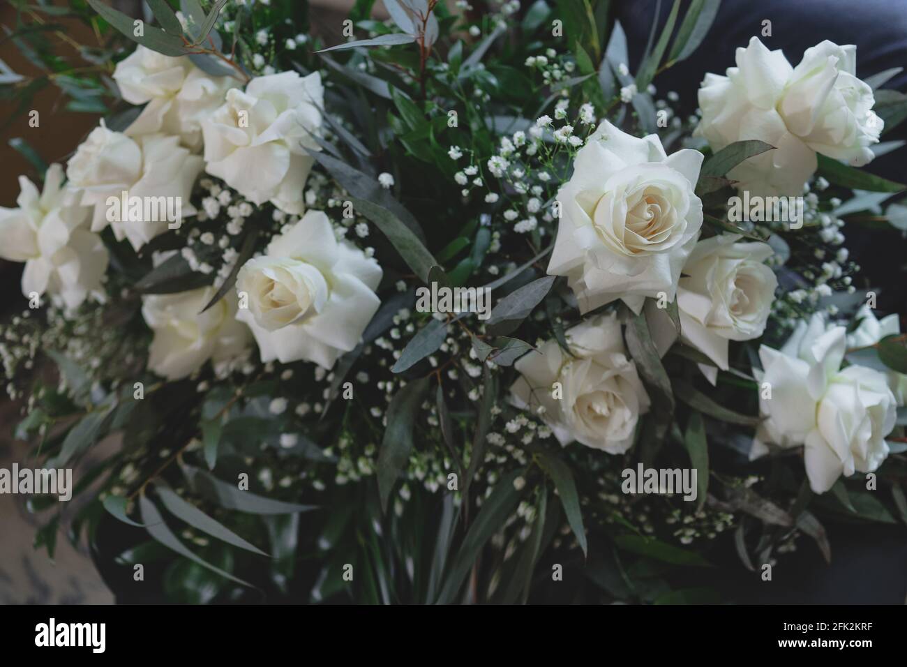Boho style wedding bouquet of white roses Stock Photo - Alamy