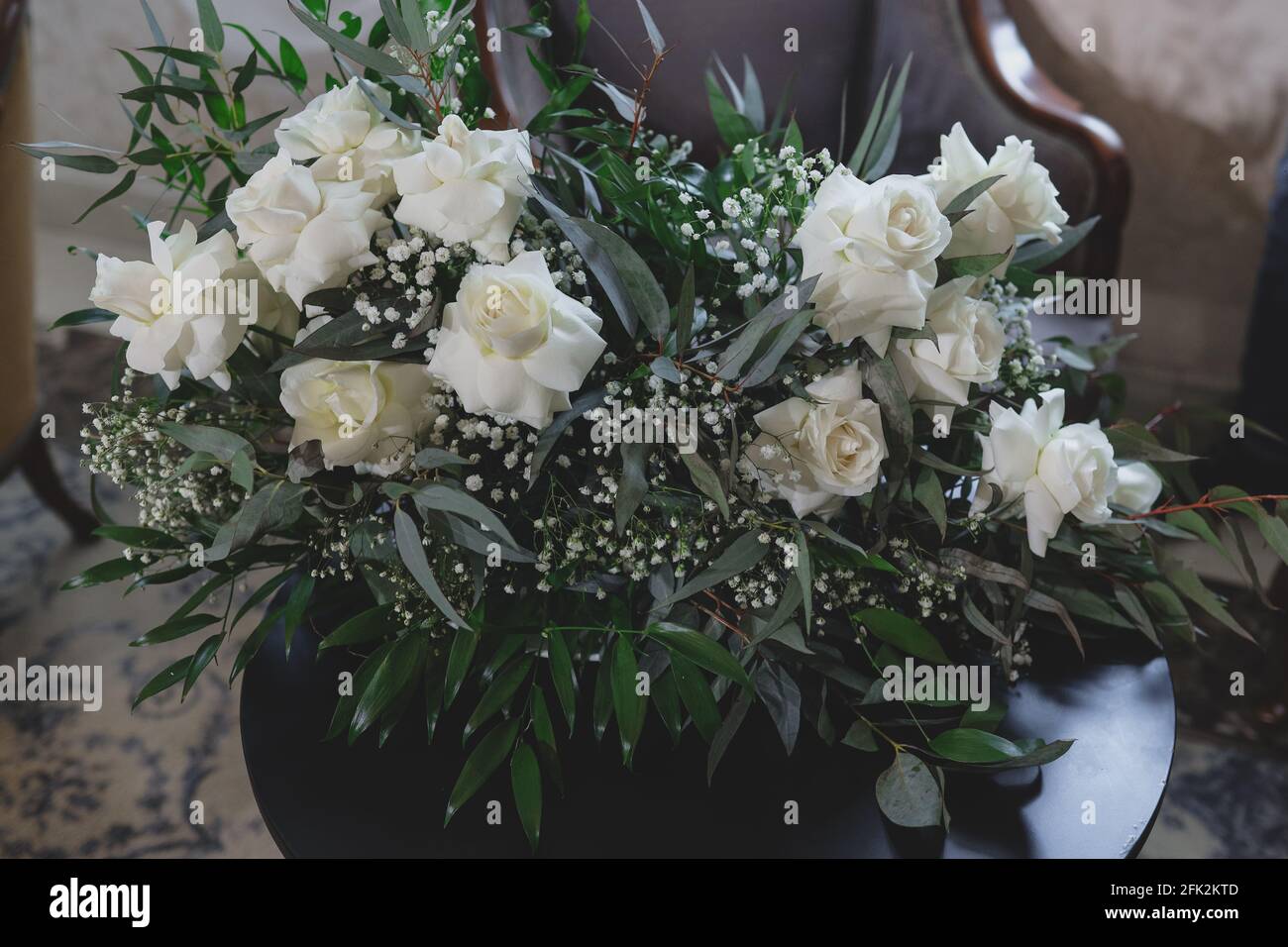 Boho style wedding bouquet of white roses Stock Photo - Alamy