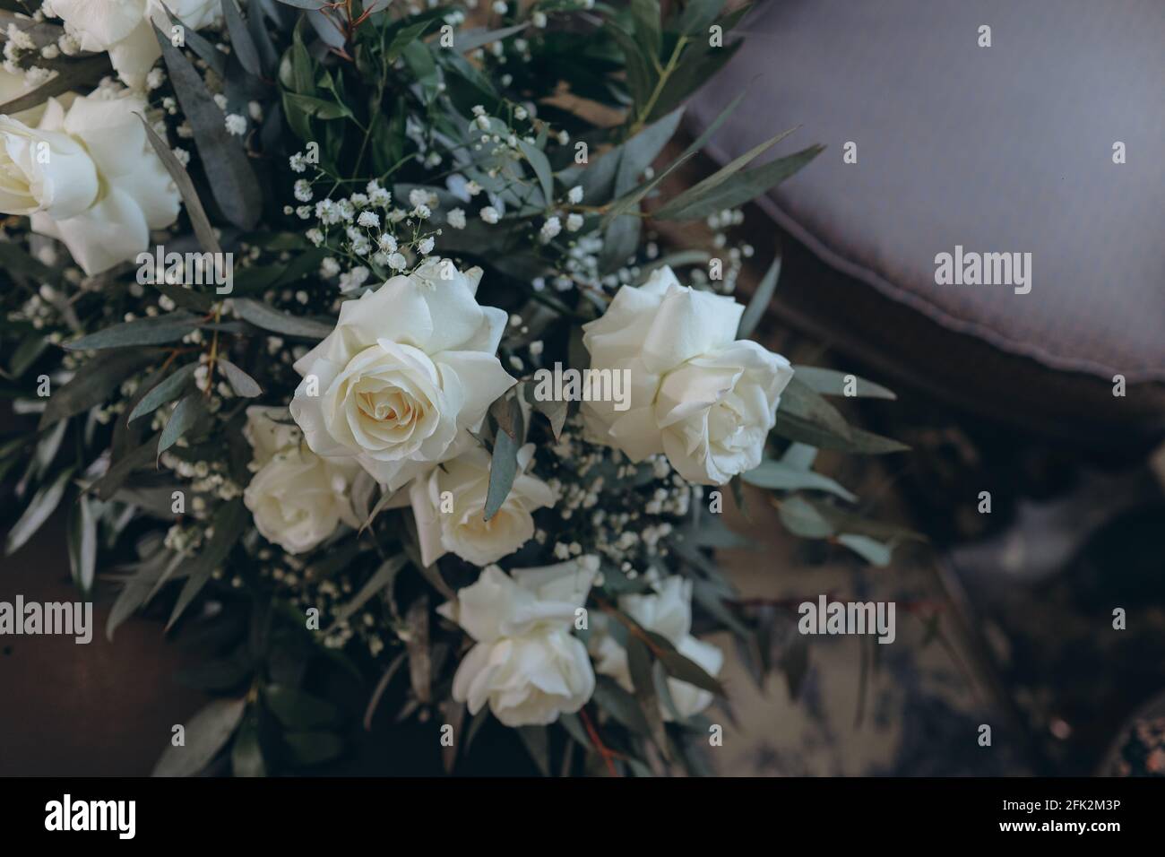 Boho style wedding bouquet of white roses Stock Photo - Alamy