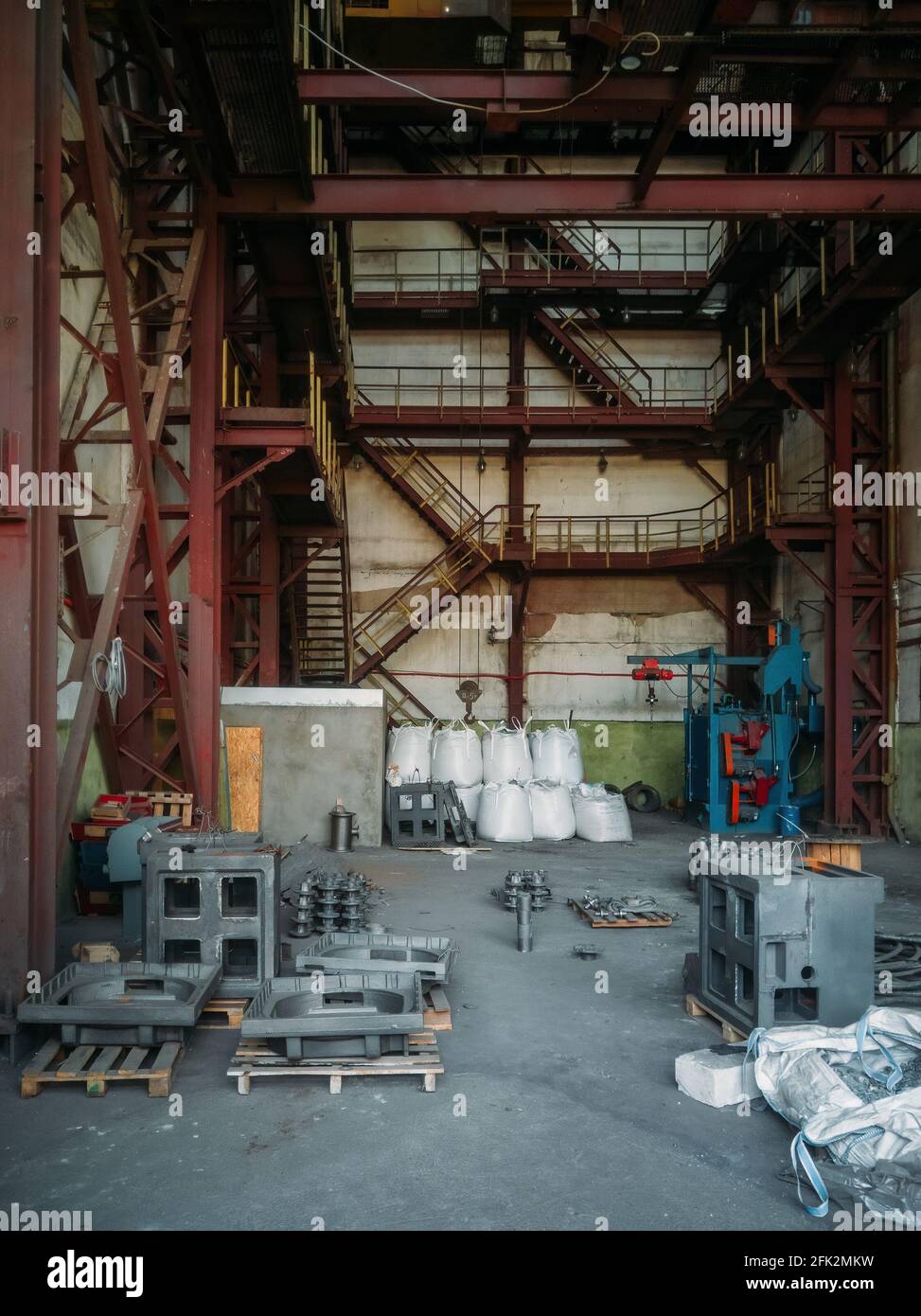 White polyethylene bags with factory products in warehouse Stock Photo ...