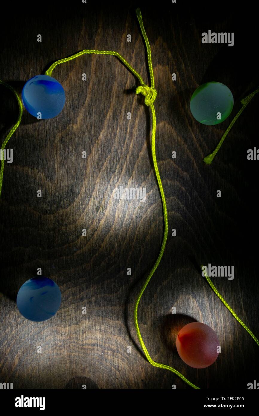 Marbles + String Stock Photo - Alamy