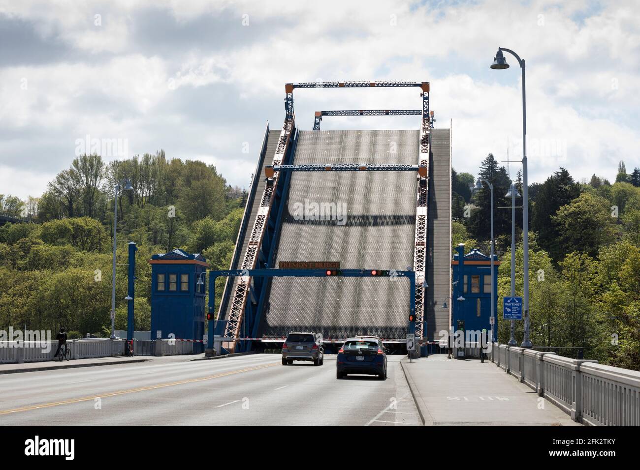 The Fremont Bridge opens for boats on the Lake Washington Ship Canal to ...