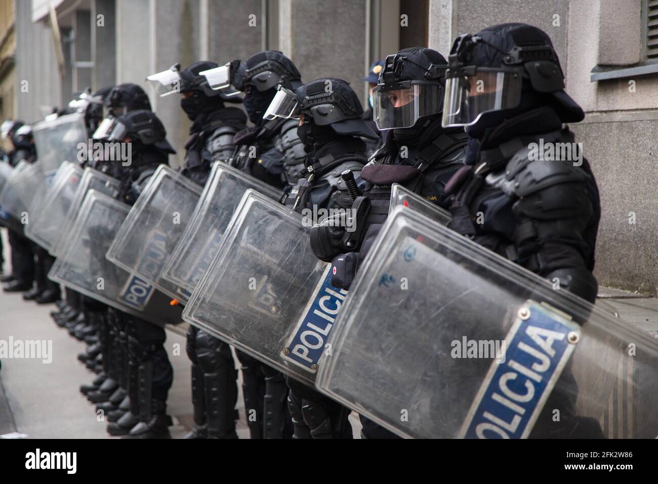Riot police stands guard in front of the Government Building during the ...