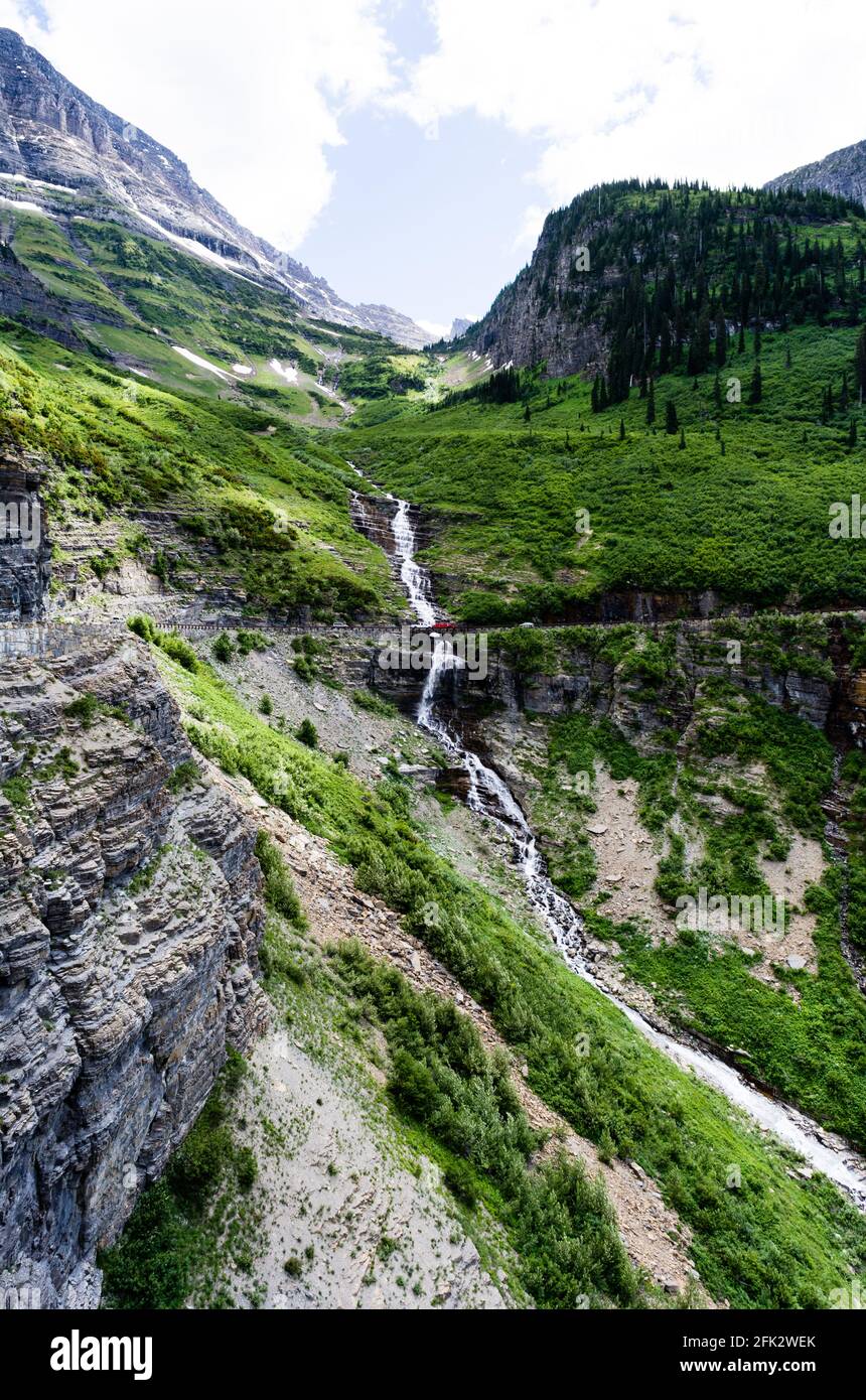 Weeping wall waterfall along Going-to-the-sun road in Glacier National ...