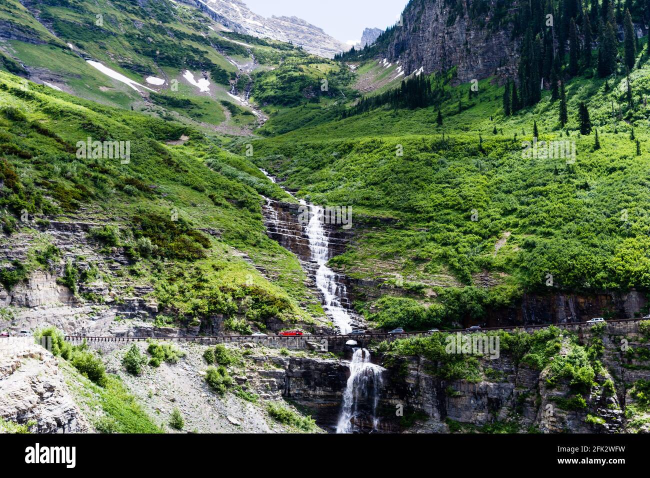 Weeping wall waterfall along Going-to-the-sun road in Glacier National ...