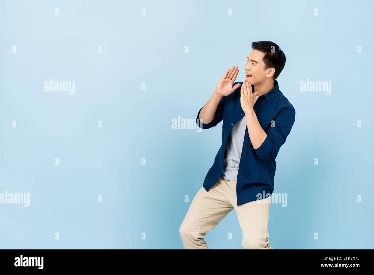 Yell hands cupping mouth hi-res stock photography and images - Alamy