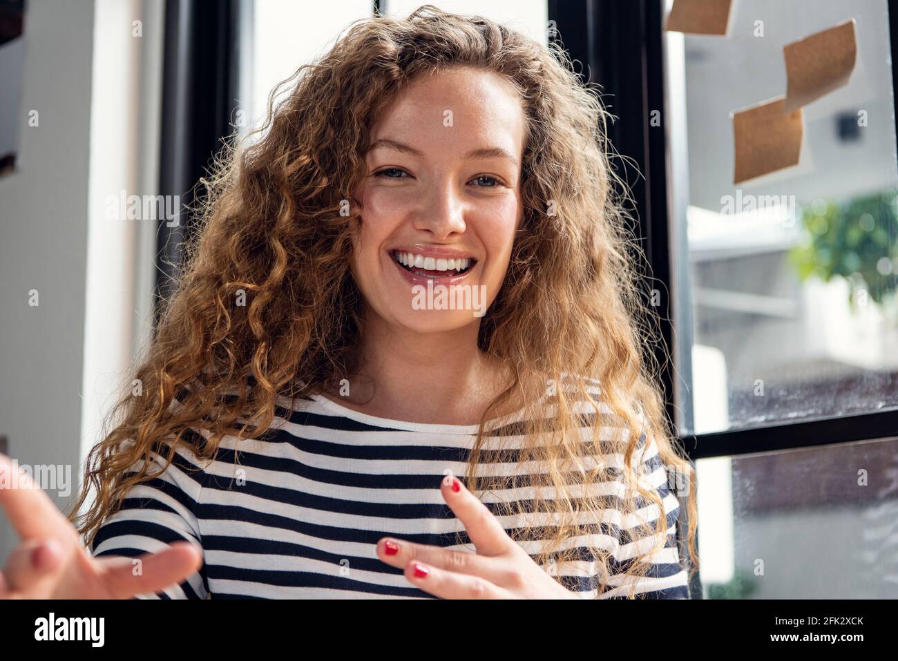 Close Up Shot Of Happy Smiling Caucasian Woman Talking While Making