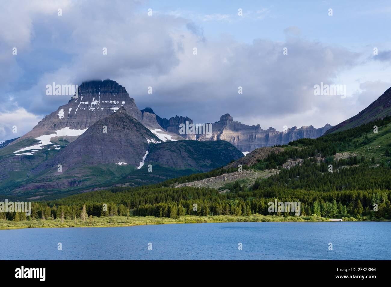 Sunrise over Lake Swiftcurrent in Many Glacier area of Glacier National ...