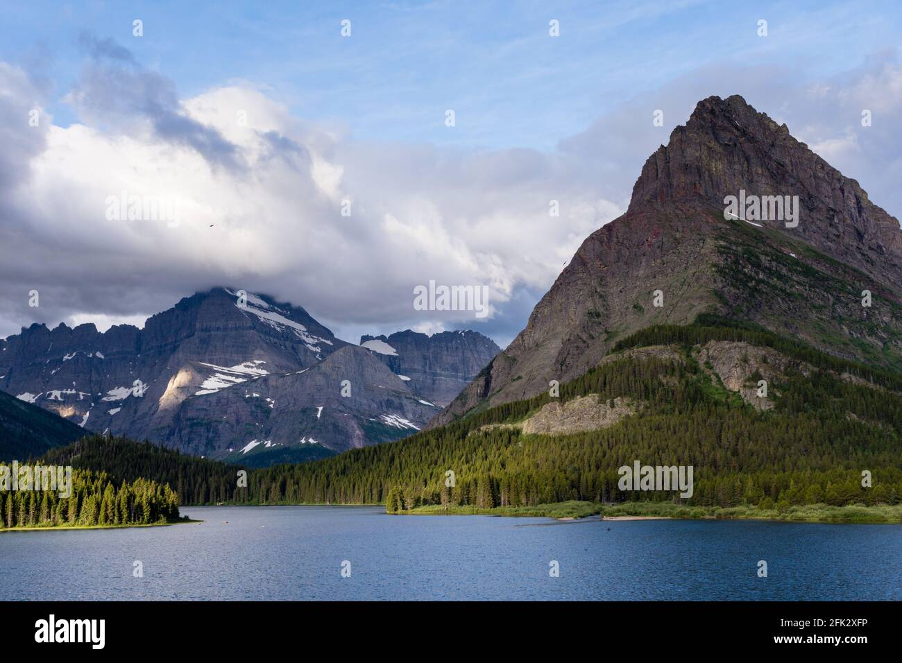 Sunrise over Lake Swiftcurrent in Many Glacier area of Glacier National ...