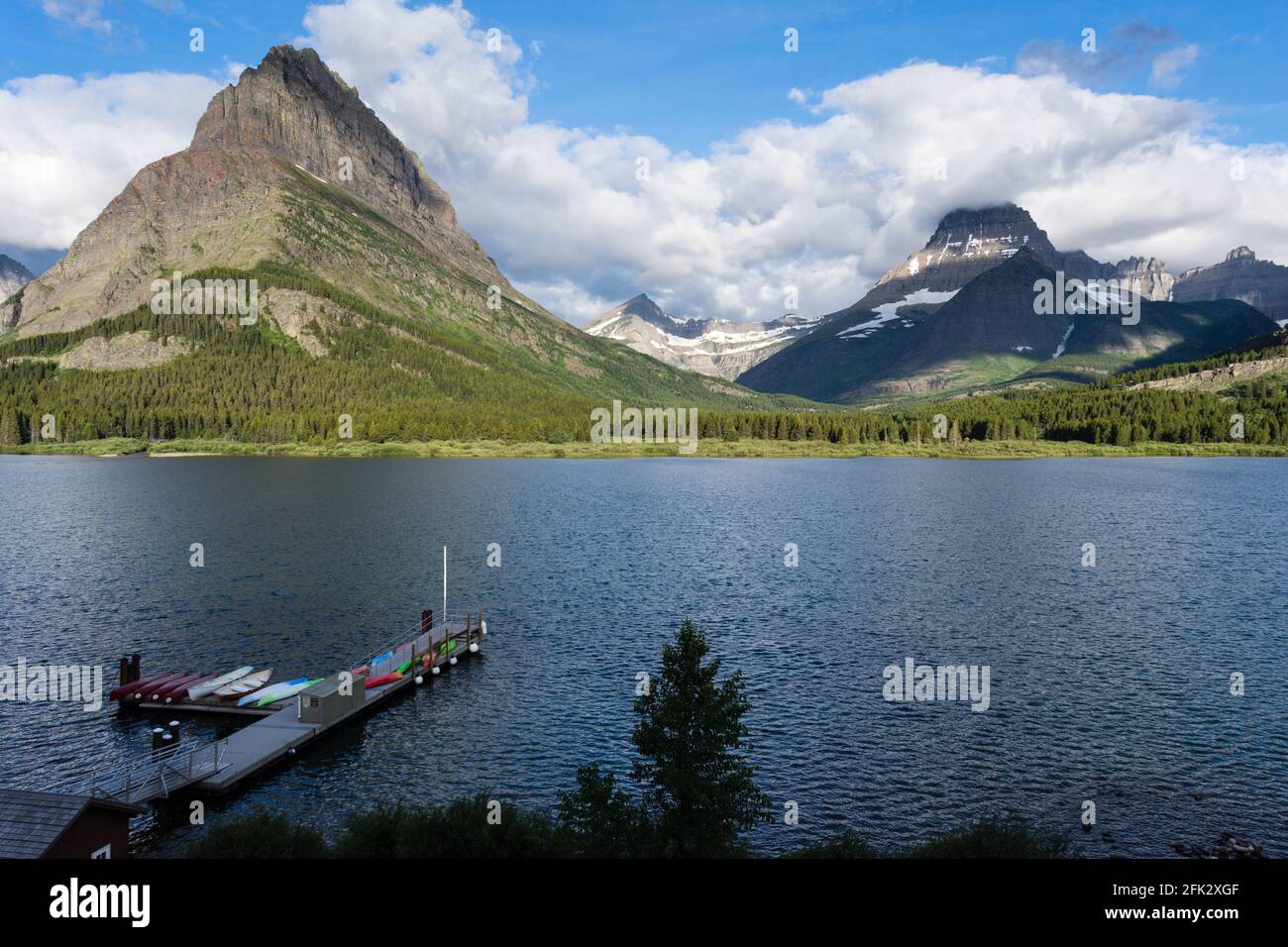Sunrise over Lake Swiftcurrent in Many Glacier area of Glacier National ...