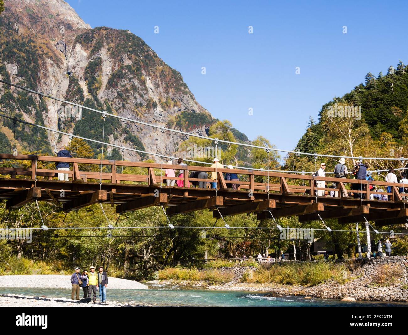 Matsumoto, Japan - October 7, 2015: Tourists crossing the Kappa-bashi ...