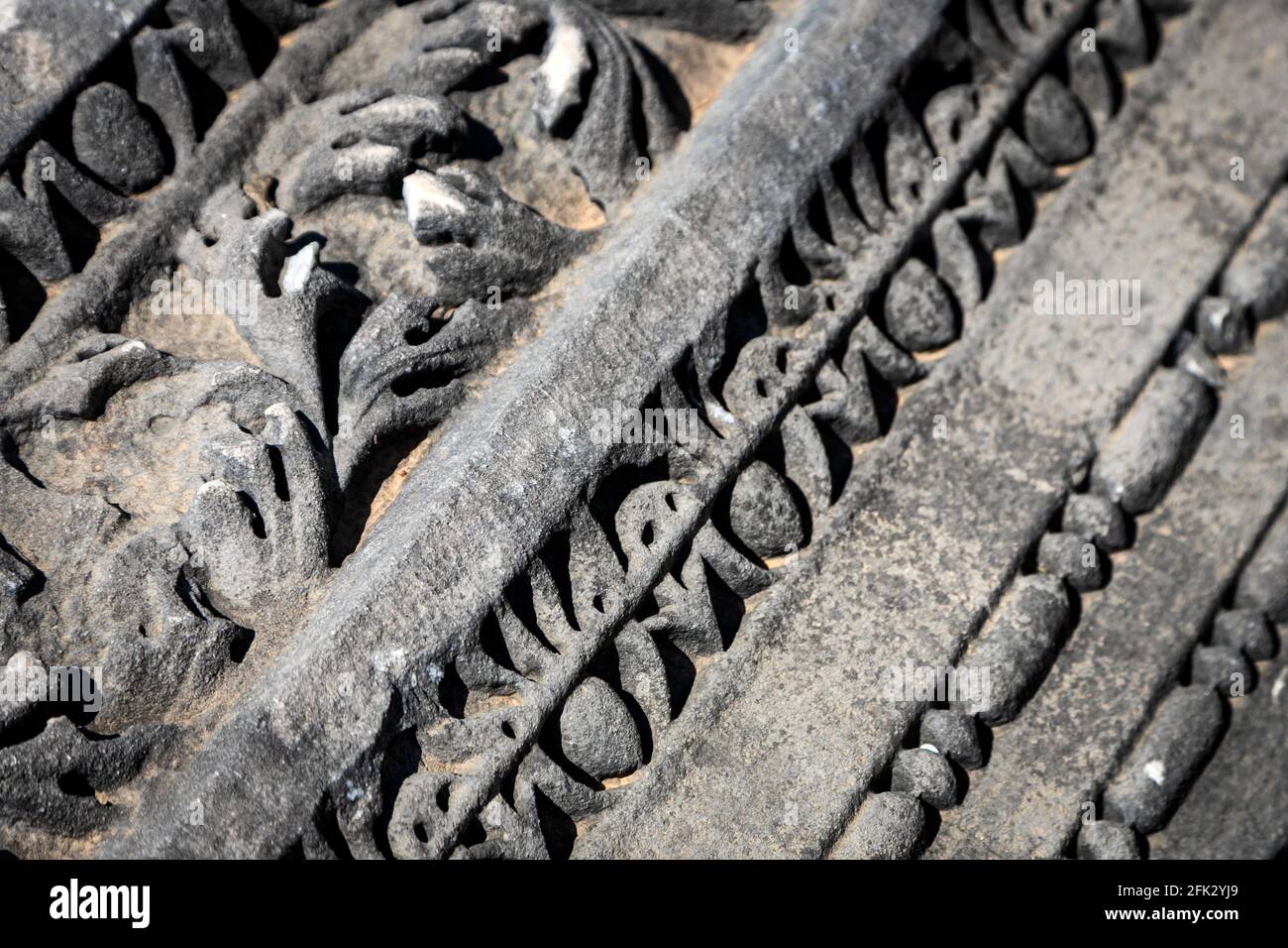 Close-up pattern on antique stone column.Elements of ancient Greek ...