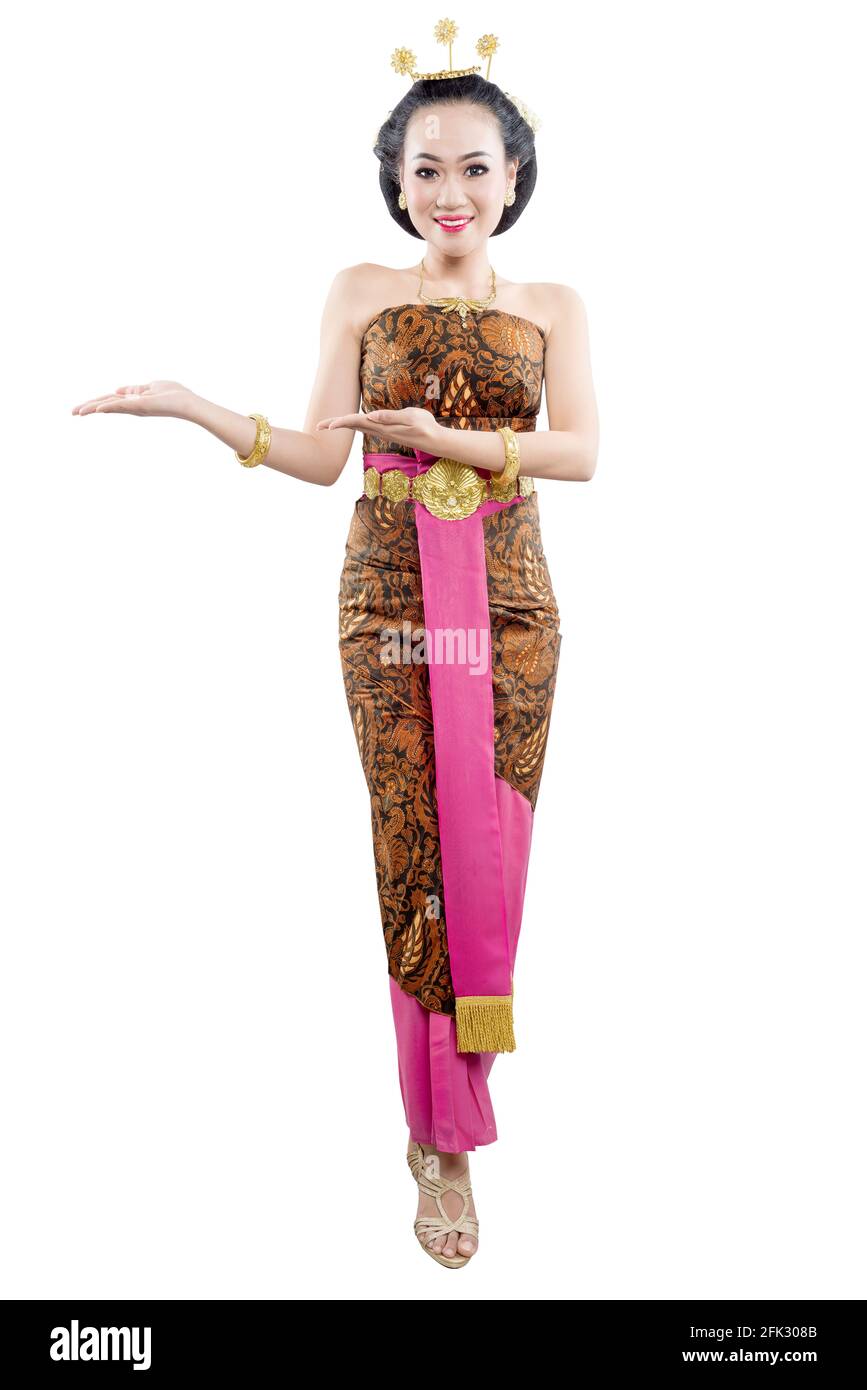Asian woman with Java traditional dance costume showing something ...