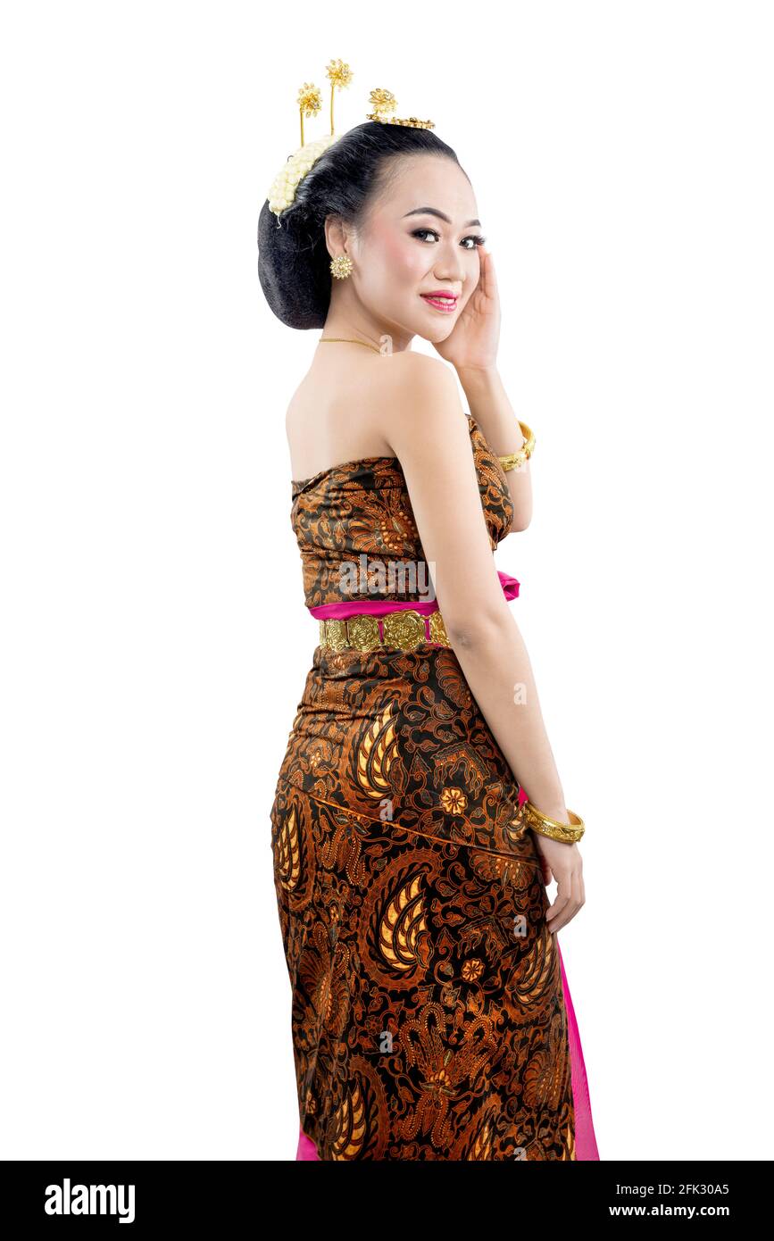Asian woman with Java traditional dance costume isolated over white ...