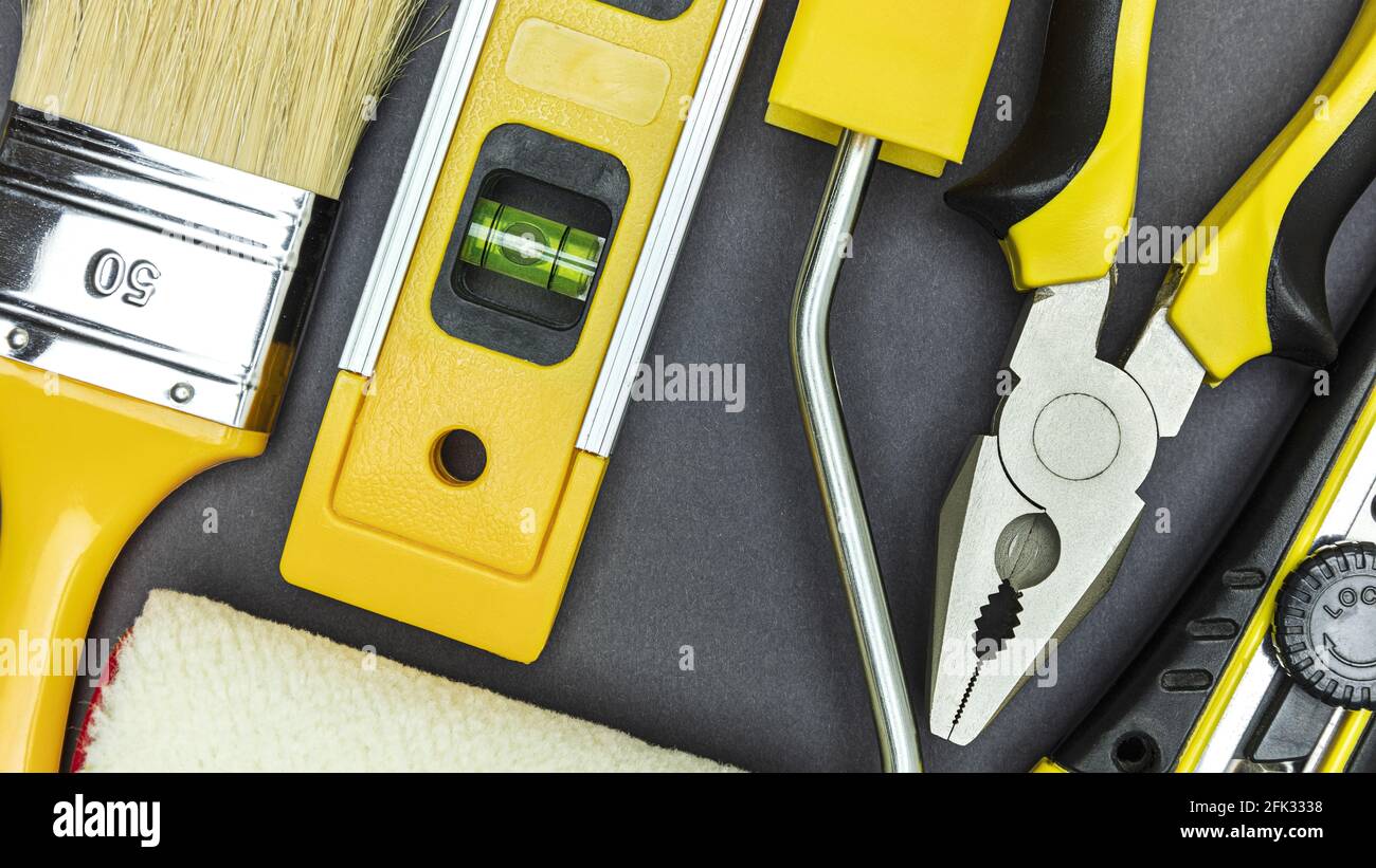 different hand tools for construction and repair. closeup top view on ...