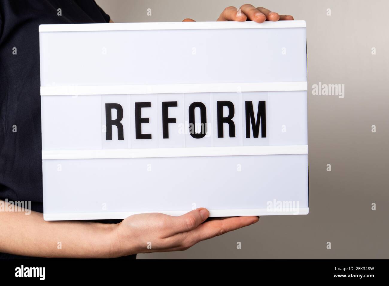 Reform. Text in light box. Medicine, education and economics concept ...