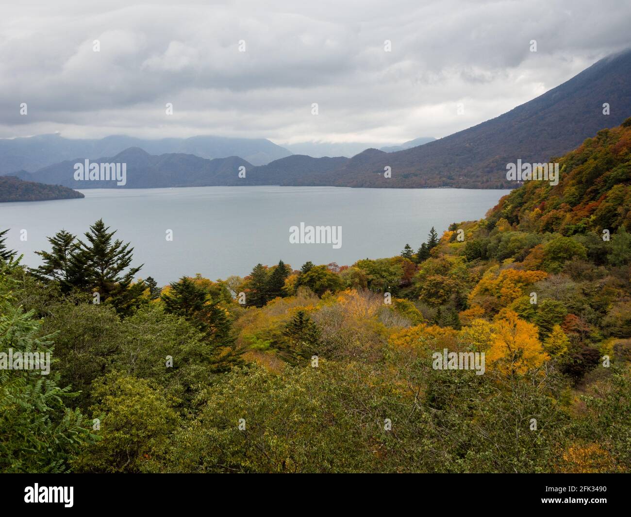Fall colors in Nikko national park, Japan - view of Mount Nantai and ...