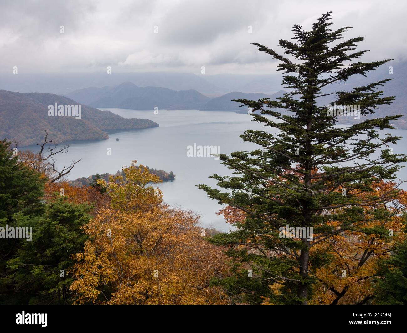 Fall colors in Nikko national park, Japan - view of Lake Chuzenji from ...