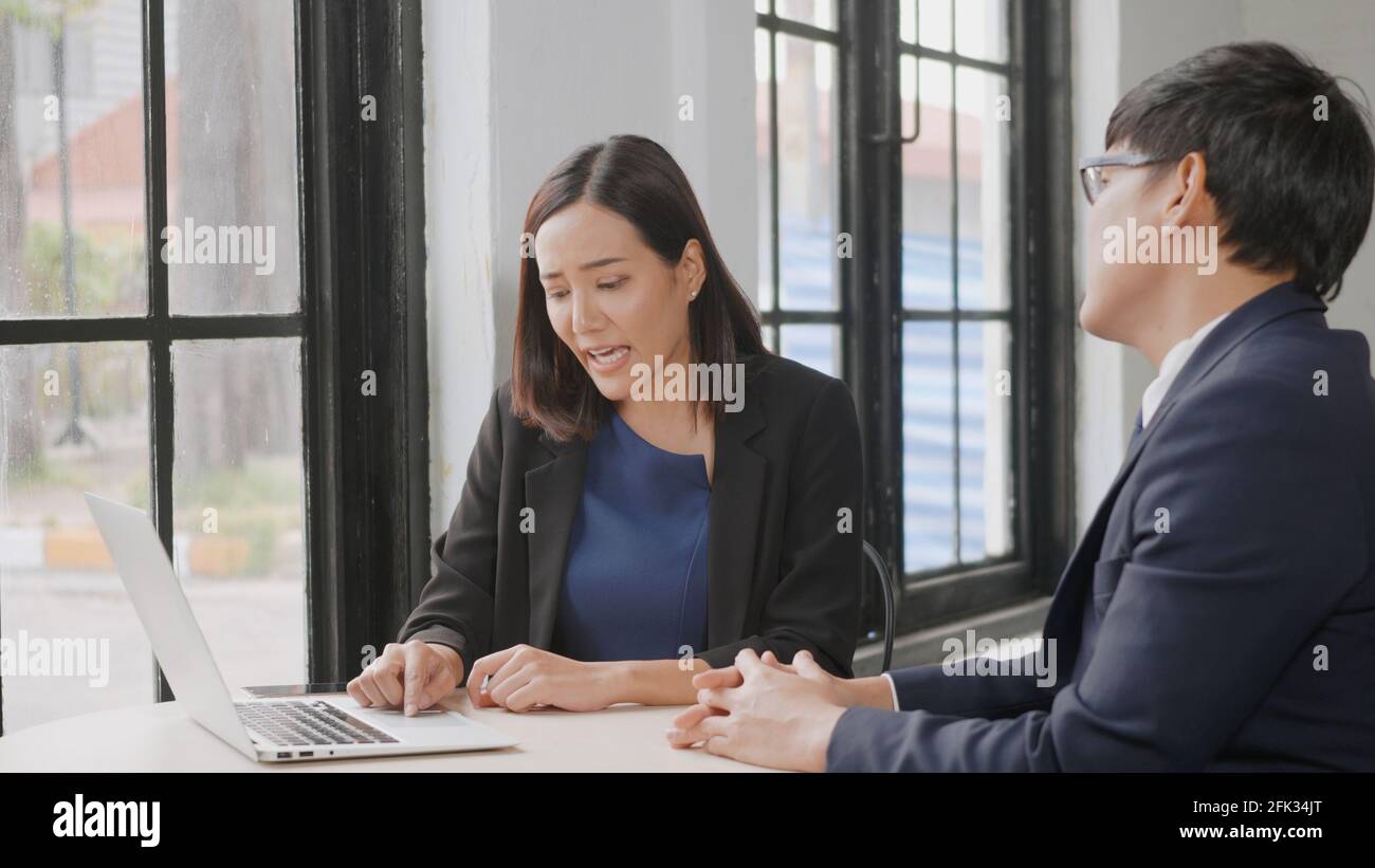 Two business people talk project strategy at office, Businessman and ...