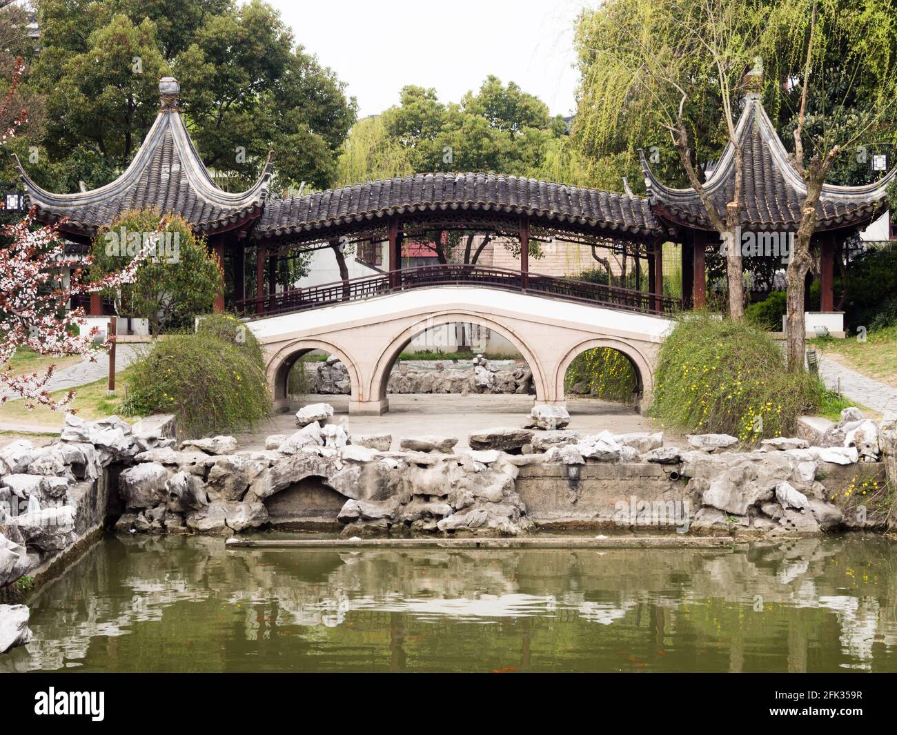 Covered bridge in classical Chinese garden in Suzhou Stock Photo - Alamy