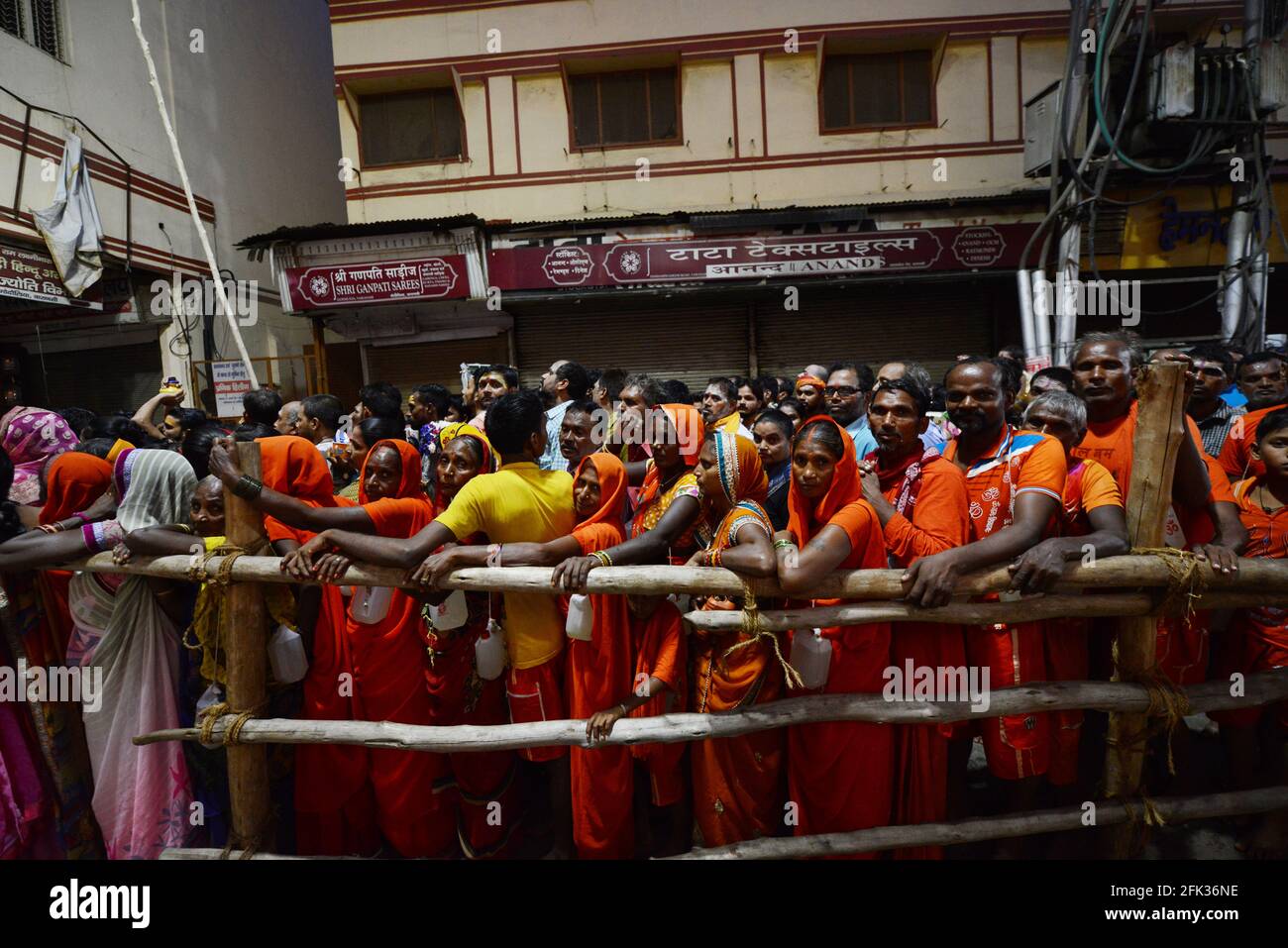 Pilgrims waiting in line to reach the ghats by the Ganges river during ...