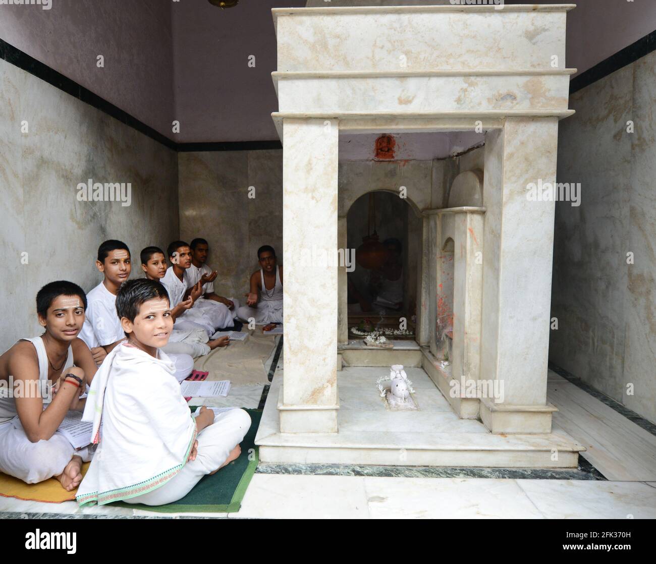 Brahmin Boys studying a holy text in a small temple in the old city of ...