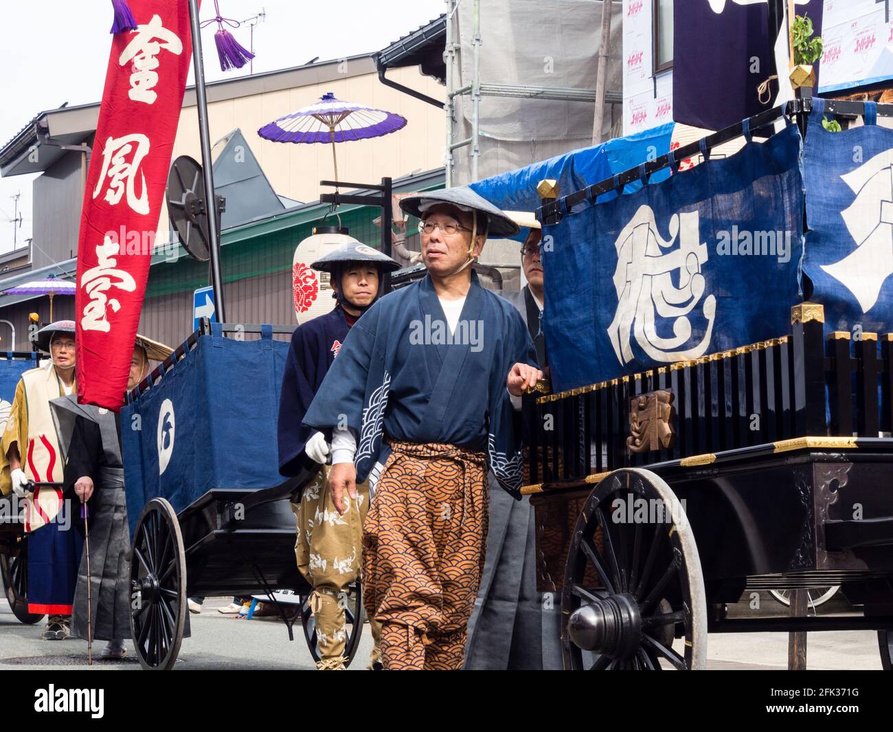 Takayama, Japan - October 10, 2015: Local men in traditional costumes ...