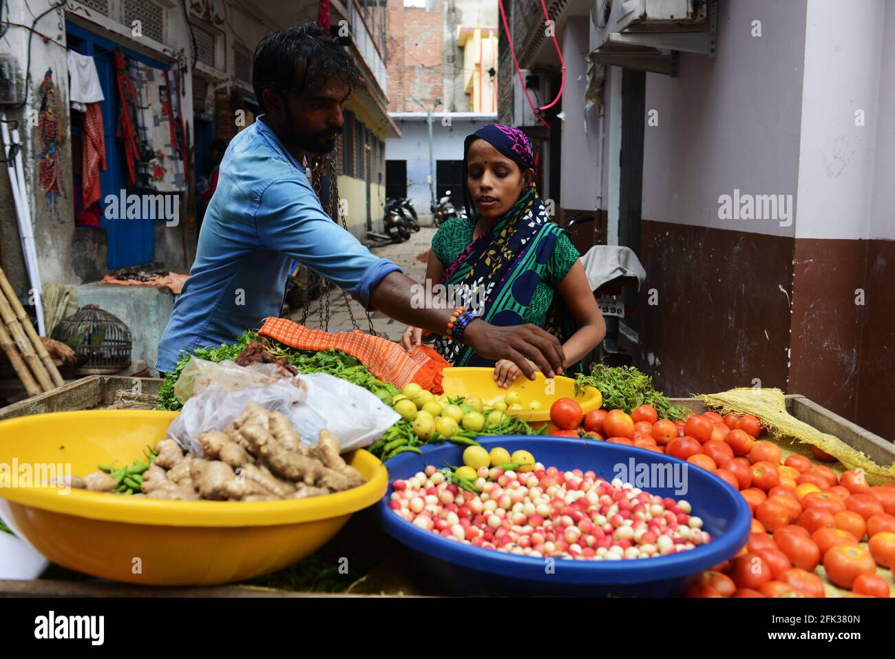 A colorful street market in the old city of Varanasi, India Stock Photo ...