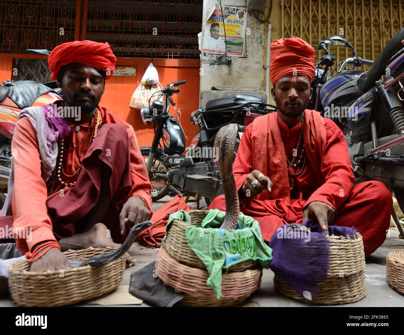 Traditional Indian snake charmers entertaining the crowed in the old ...