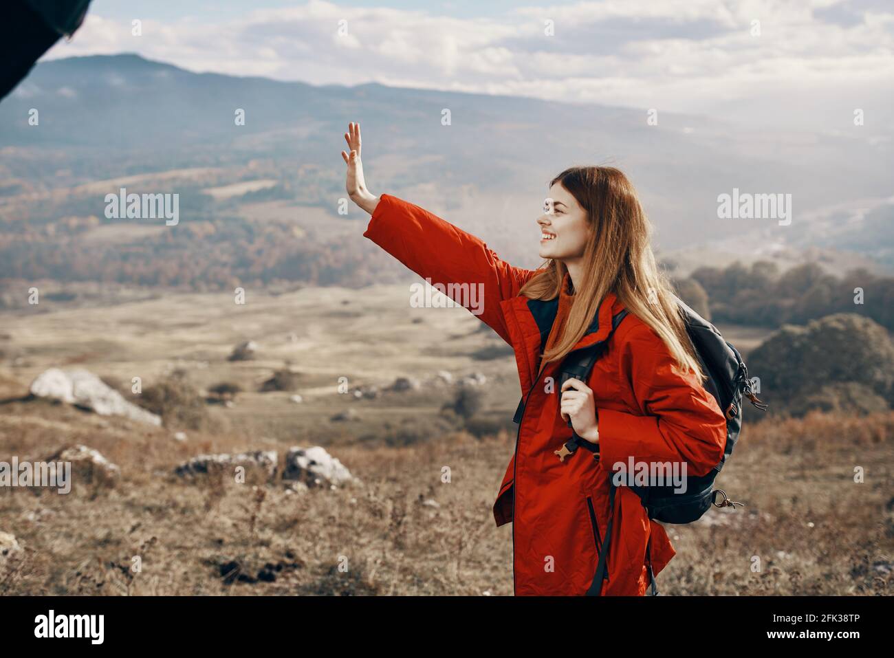 Travel woman with backpack rest in the mountains on nature landscape ...