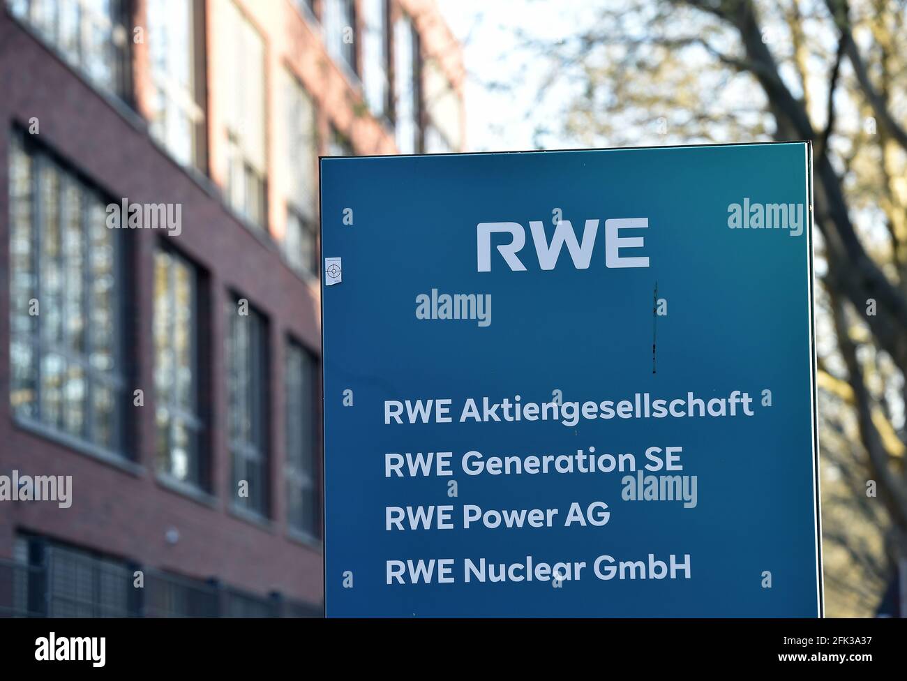 Essen, Germany. 28th Apr, 2021. A sign with the RWE logo stands in ...