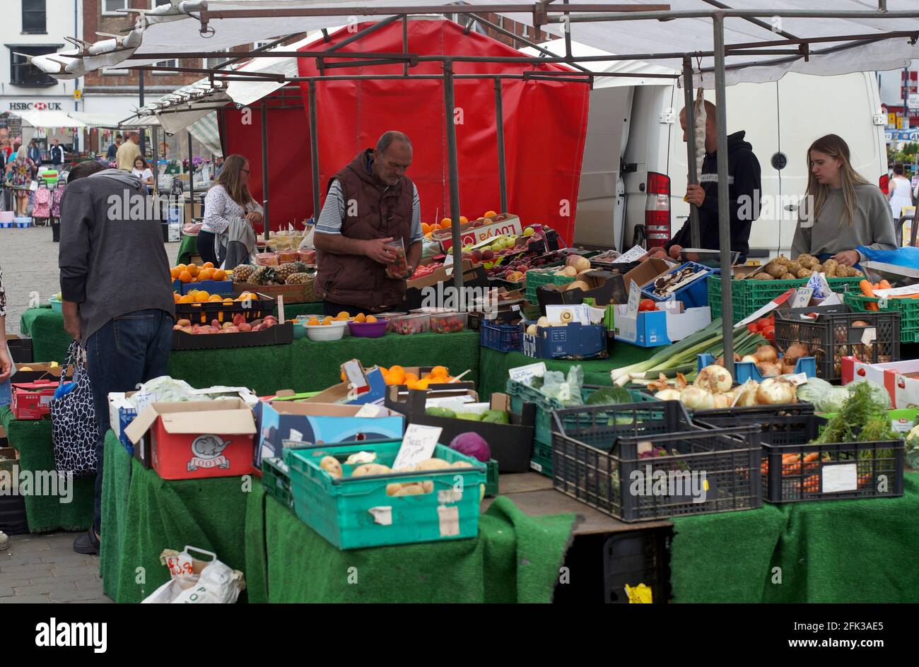 a stall selling local produce at the local market Stock Photo - Alamy