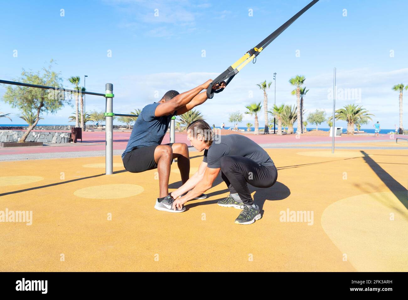 Black man trx exercise hi-res stock photography and images - Alamy